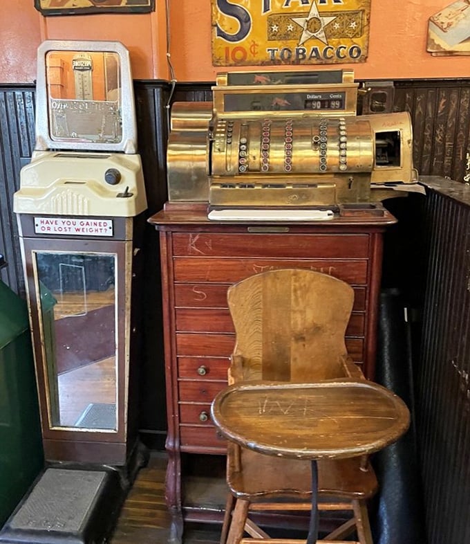 The antique brass cash register isn't just decoration &ndash; it's a working piece of history that's been ringing up Yesterdog's loyal customers for decades.