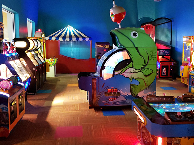 The arcade's fishing game stands ready to challenge hand-eye coordination and reward persistence with tickets for treasures.