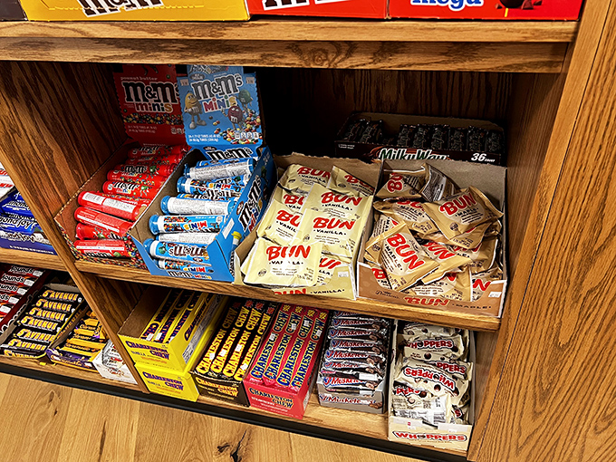Candy shelves stocked with nostalgic treats &ndash; where Bun bars and M&Ms create a museum of confectionery history you can actually eat.
