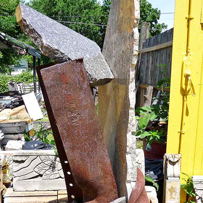 Abstract forms reach skyward in this sculpture garden, where concrete and metal dance together in an industrial ballet.