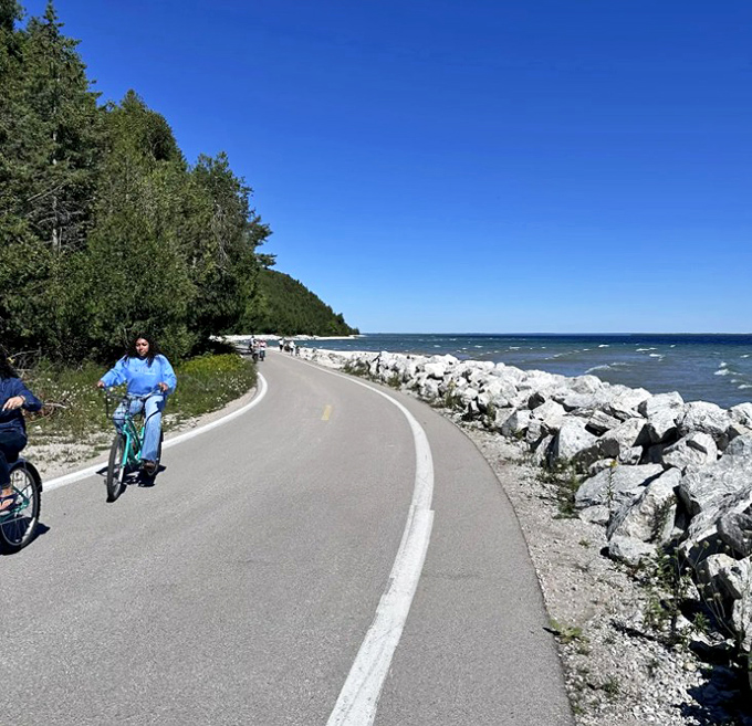 Riders enjoy the perfect balance of forest shade and open shoreline, where Lake Huron's waves provide the soundtrack to their journey.