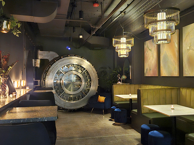 Elegant chandeliers cast a warm glow over the space, where every detail from lighting to seating has been thoughtfully considered.