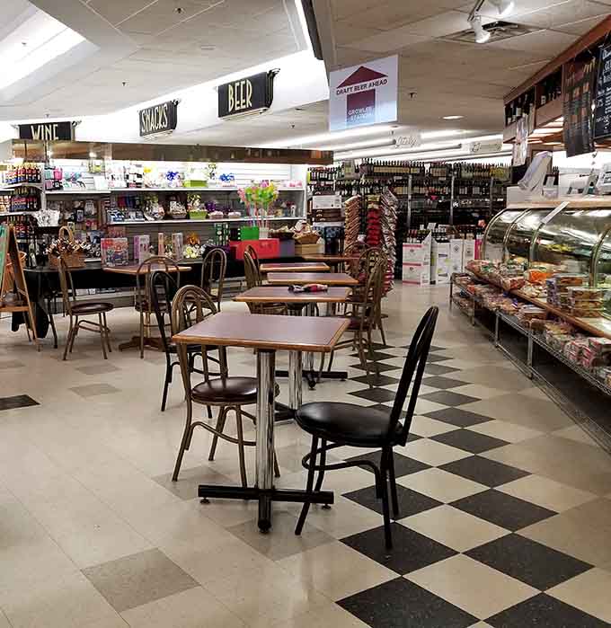 Vintage mirrors reflect the gentle bustle of the caf&eacute;, where comfortable seating invites guests to linger longer than planned.