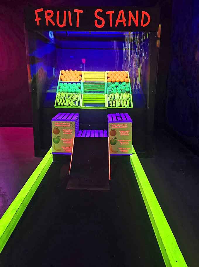Fruit Stand This hole gives "playing with your food" a whole new meaning, with neon produce that looks deliciously unreal under black lights.