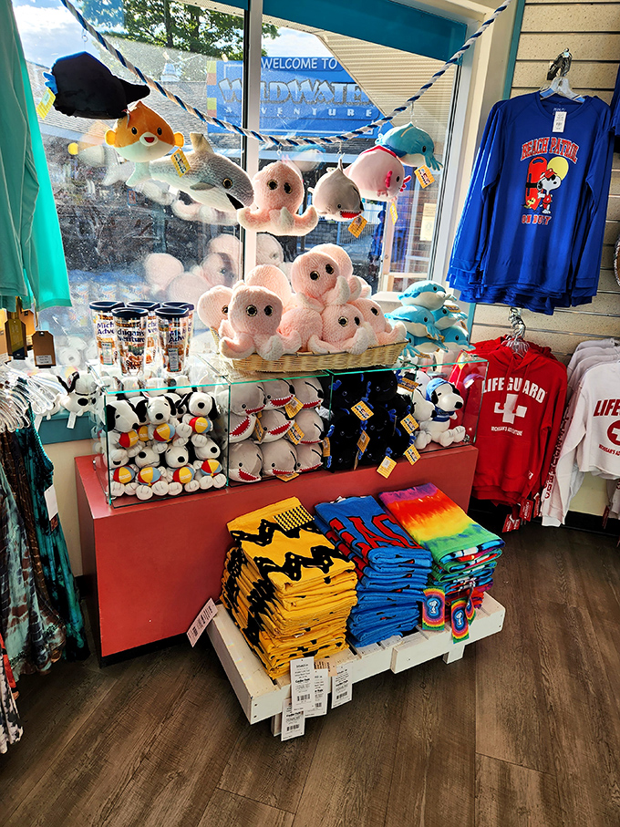 The gift shop displays plush sea creatures and branded merchandise &ndash; because nothing says "I survived the water slides" like a stuffed octopus wearing sunglasses.