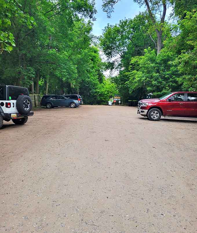The unassuming gateway to adventure &ndash; this humble parking area doesn't hint at the natural wonders waiting just beyond the trees.