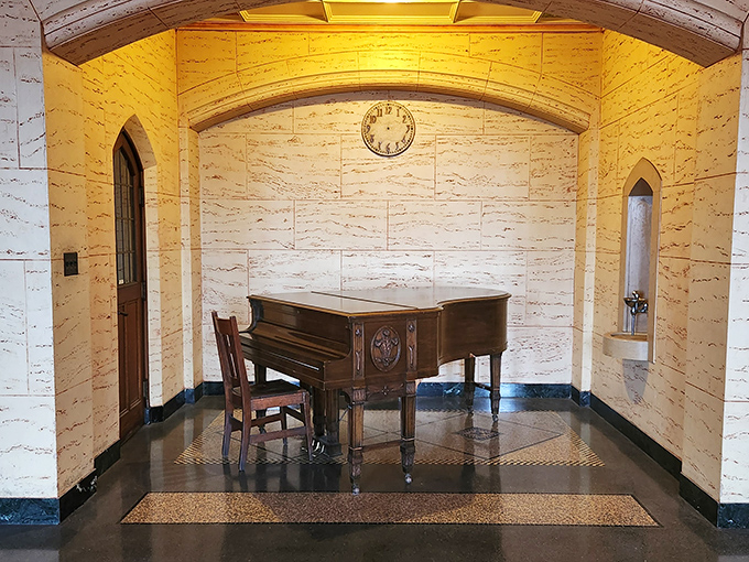 This solitary piano in its marble alcove seems to hold its breath, waiting for the next musician to bring melodies to the temple's halls.
