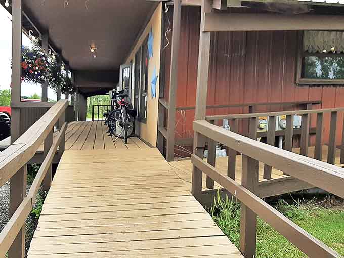 The welcoming porch invites visitors to slow down and stay awhile – Michigan hospitality starts before you even step inside.