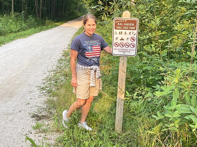 Trail ambassadors come in all forms &ndash; this visitor pauses to appreciate the park that connects communities and preserves Michigan's natural beauty.