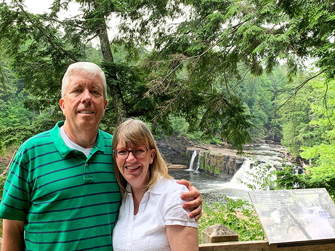 Visitors pause to absorb the scene, their expressions reflecting the universal human response to witnessing something genuinely magnificent.