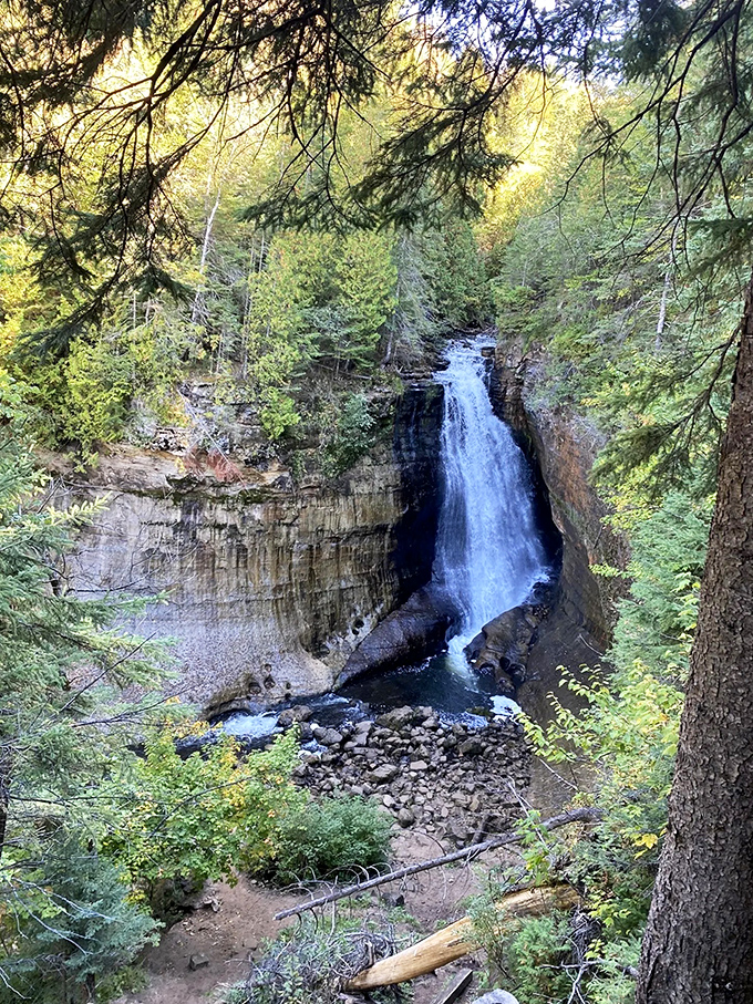 The waterfall reveals itself from another angle, proving that beauty, like the best conversations, changes depending on where you stand.