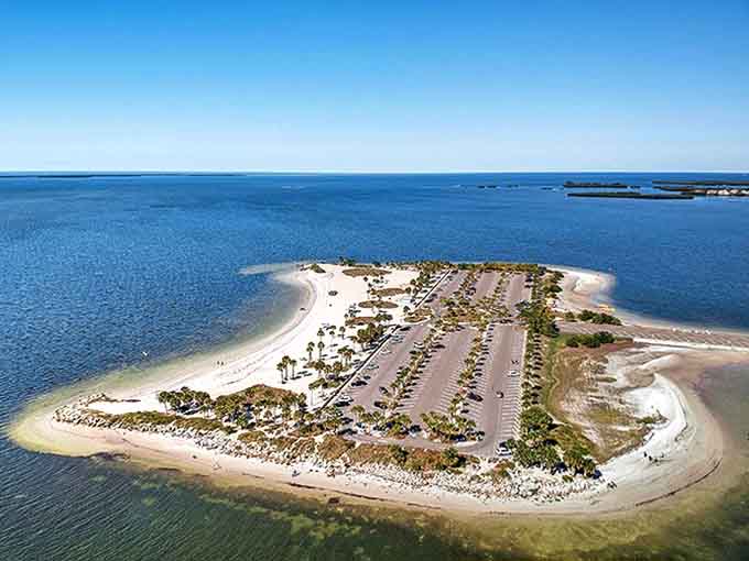 This crescent-shaped beach peninsula offers the perfect compromise &ndash; pristine shoreline with convenient parking just steps from paradise.