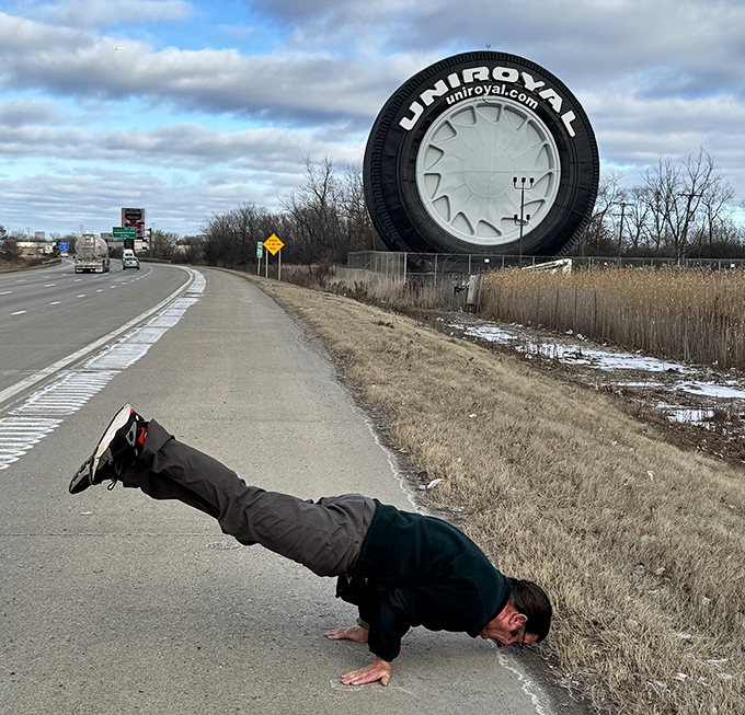 Some visitors find creative ways to photograph this oversized attraction &ndash; proving the tire inspires both awe and playfulness.