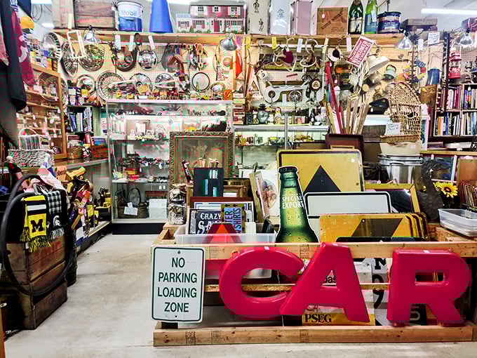 The "CAR" sign says it all &ndash; automotive memorabilia shares space with vintage signs and sports collectibles in this nostalgia-packed corner.