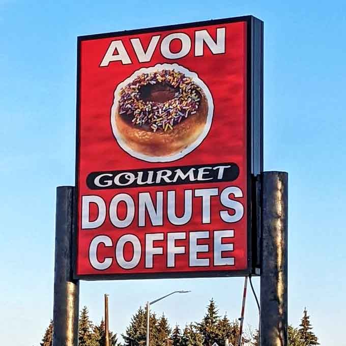The iconic Avon sign stands as a beacon of hope for the sugar-deprived, promising gourmet satisfaction just ahead.