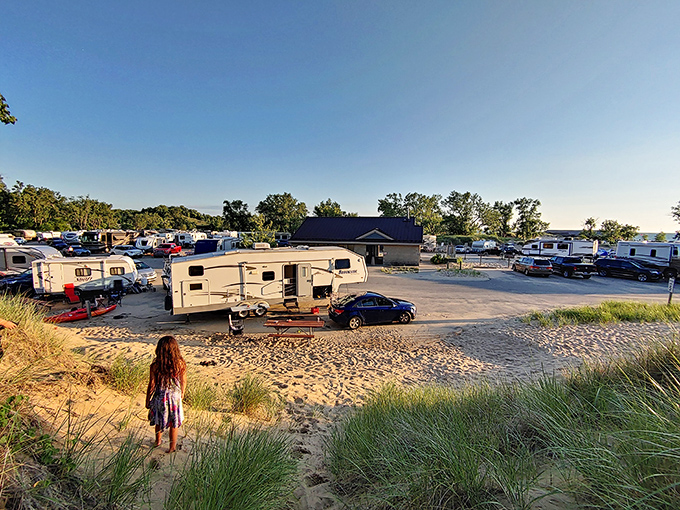 Sunset at the campground &ndash; where RVs and tents become temporary neighborhoods united by marshmallow roasting and stargazing.
