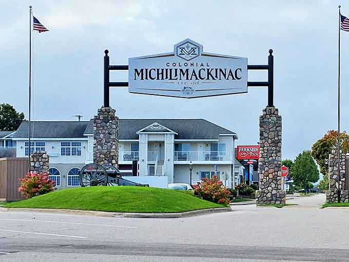Your gateway to the 18th century: Colonial Michilimackinac's welcoming entrance sign promises an immersive journey through time, no flux capacitor required.