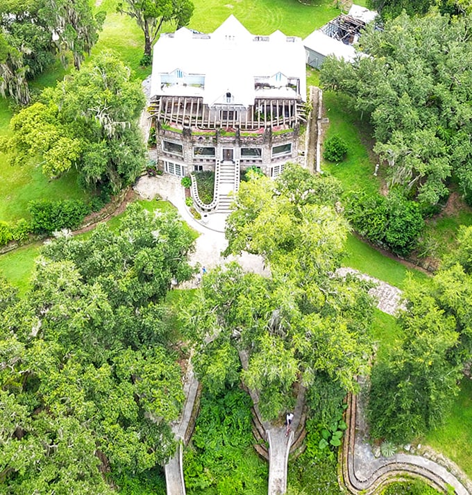 A bird's-eye perspective showcases how the Wonder House sits like an architectural island in a sea of lush Florida greenery.
