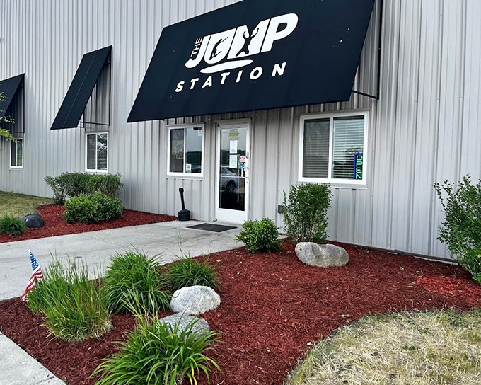 Simple landscaping frames the entrance to this house of bounce, where inside, the laws of gravity take a temporary vacation.