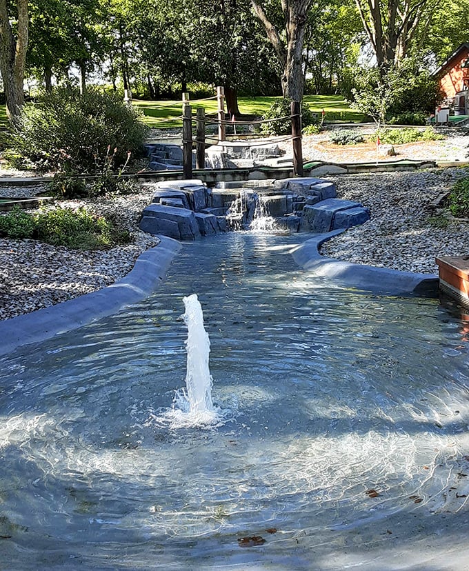 The property's charming water feature creates a tranquil soundtrack for visitors enjoying the grounds after their underground adventure.