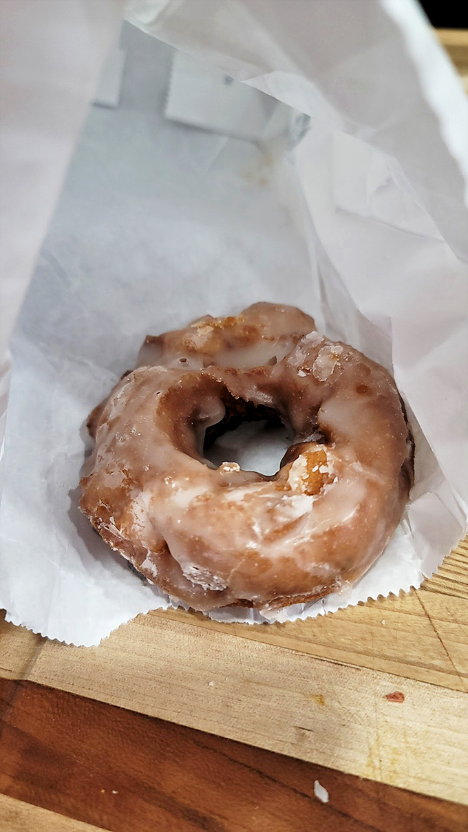 The ultimate close-up: a single glazed donut that perfectly captures why people make pilgrimages from across the state to this small-town bakery.
