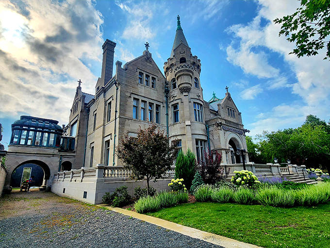 The castle's exterior glows in evening light, its turrets and stonework creating a silhouette that seems transported from a European fairytale to Minneapolis.