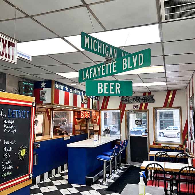 Vintage street signs hanging from the ceiling create an indoor intersection of flavor, marking this corner of Detroit as hallowed culinary ground.