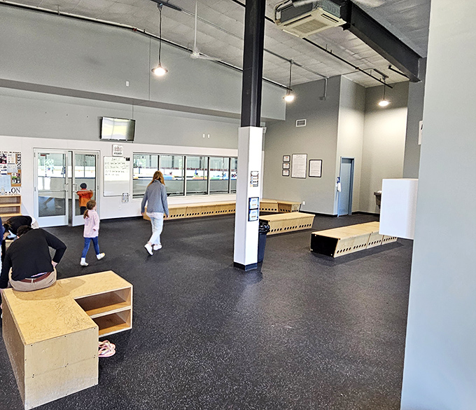 The spacious lobby provides comfortable seating for spectators and skaters taking a break from the ice.
