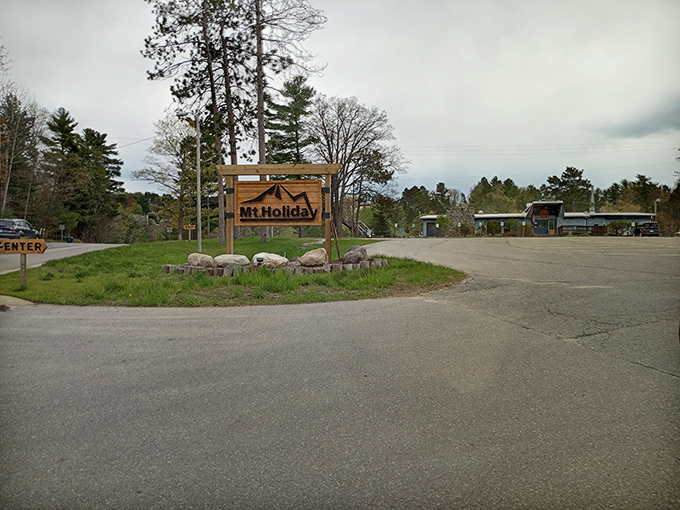 Mt. Holiday Entrance: The threshold between ordinary life and extraordinary adventure. Cross this line and prepare to collect stories worth embellishing for years.