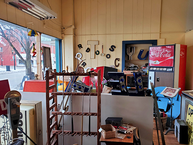 Vintage signage and Coca-Cola memorabilia create a nostalgic corner display that celebrates American advertising art and everyday brand history.