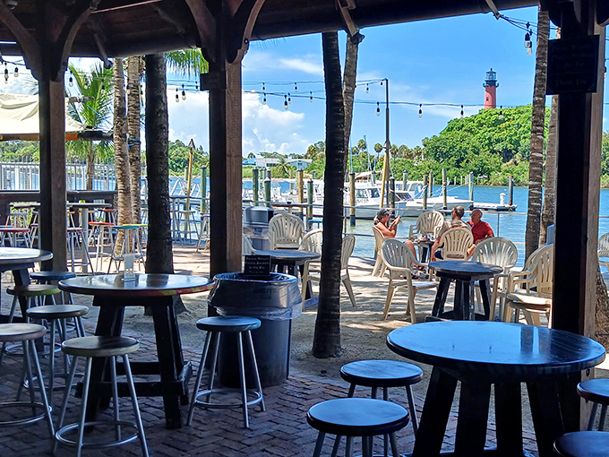 The million-dollar view costs only the price of a drink, with Jupiter Lighthouse standing sentinel over conversations and cold beverages.