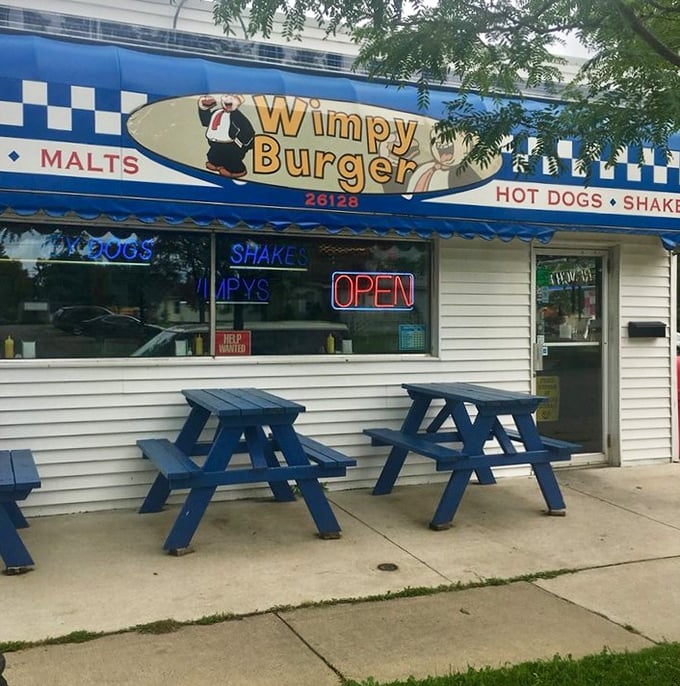 Blue picnic tables invite outdoor dining during Michigan's warmer months, extending the Wimpy experience into the fresh air of St. Clair Shores.