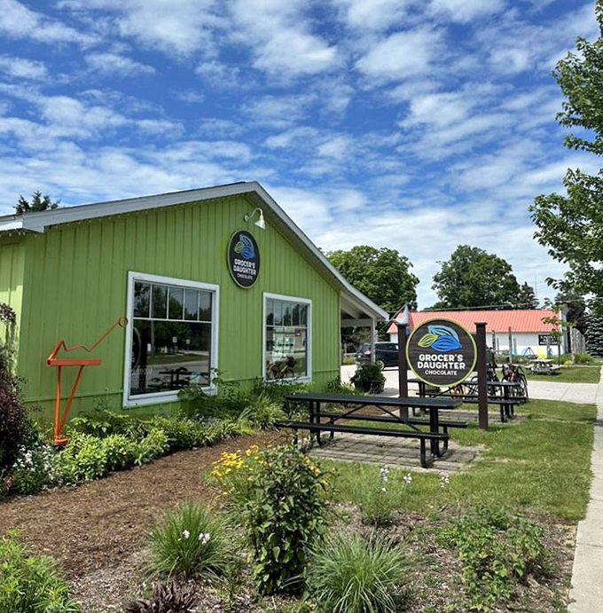Even from the outside, the distinctive Grocer's Daughter signage and vibrant building hint at the colorful flavor experiences waiting inside.