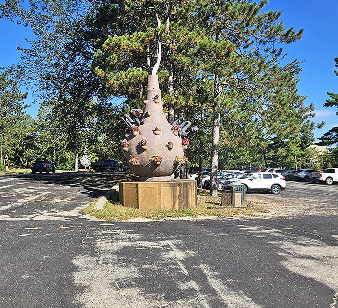 An otherworldly sculpture greets visitors in the parking area, offering the first hint that this isn't your average roadside attraction.