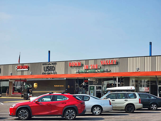 The unassuming exterior belies the wonderland within – this strip mall storefront houses five decades of musical history and counting.