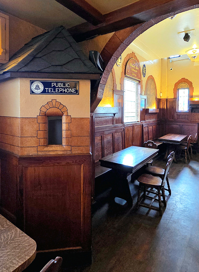 Yes, that's an actual vintage telephone booth inside. For when you need to call home and explain why you're moving to Germany via Detroit.