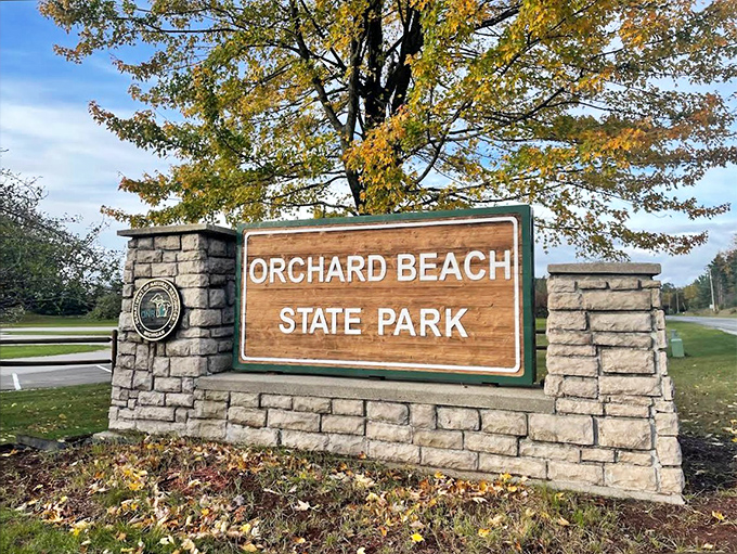 The entrance sign doesn't just mark a park boundary &ndash; it's the gateway to memories waiting to be made at Orchard Beach.