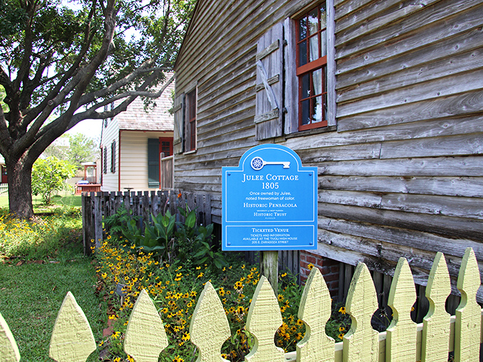 More than just a sign &ndash; this blue marker represents decades of preservation efforts ensuring Julee's legacy continues inspiring visitors.