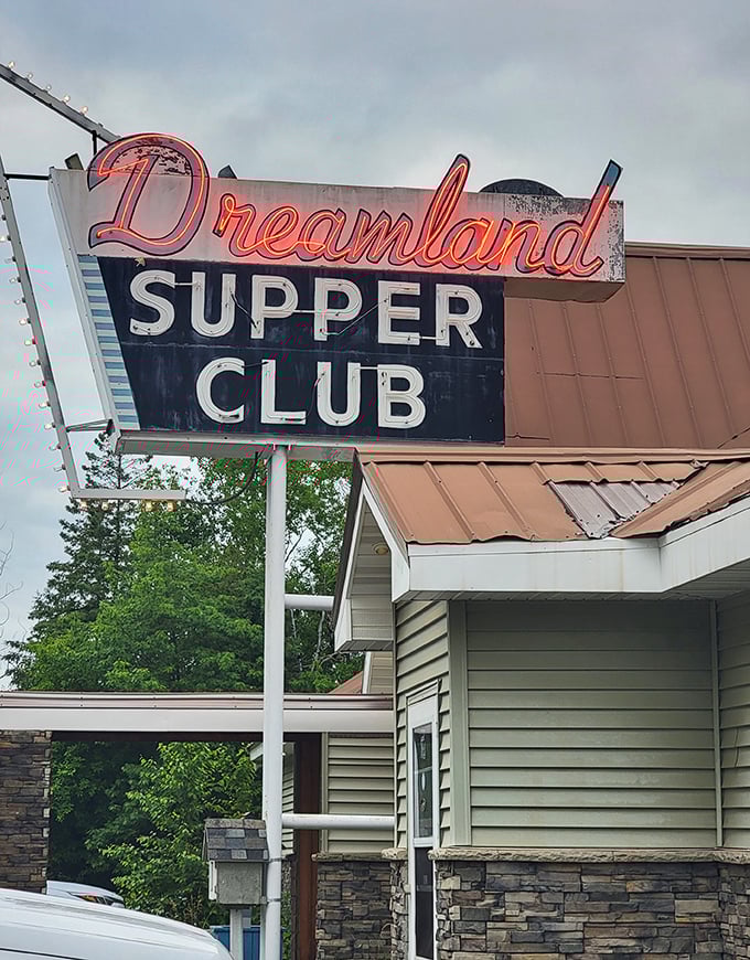 Winter's chill makes the warm exterior even more inviting – icicles frame the entrance like nature's own decorative touch.