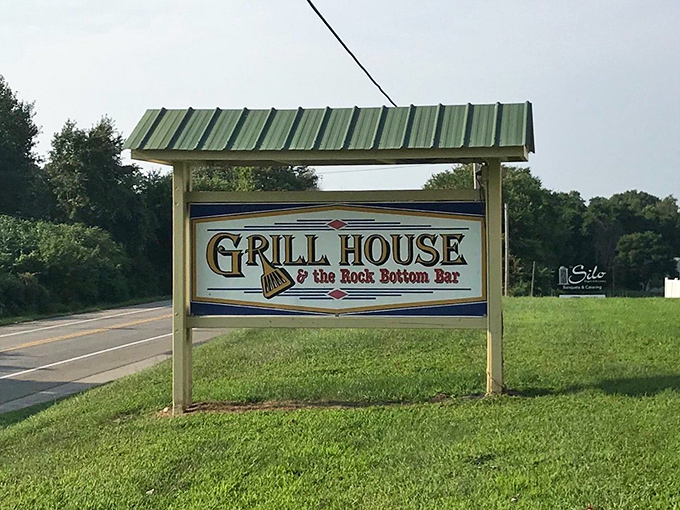 The roadside sign stands as a promise of good food and good times, beckoning hungry travelers to turn in and discover a Michigan dining legend.