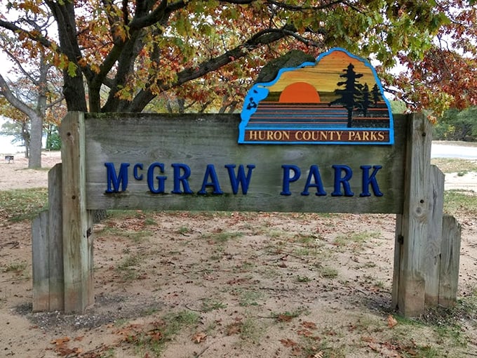 The wooden welcome sign that marks the entrance to countless summer memories and sandy car floors.
