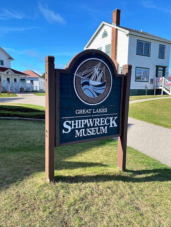 The Great Lakes Shipwreck Museum sign welcomes visitors to a place where history isn't just displayed&mdash;it's felt in your bones with every creak of the floorboards.