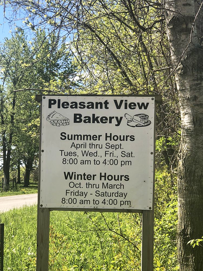 The sign tells you everything you need to know &ndash; including the seasonal hours that reflect the bakery's traditional approach.