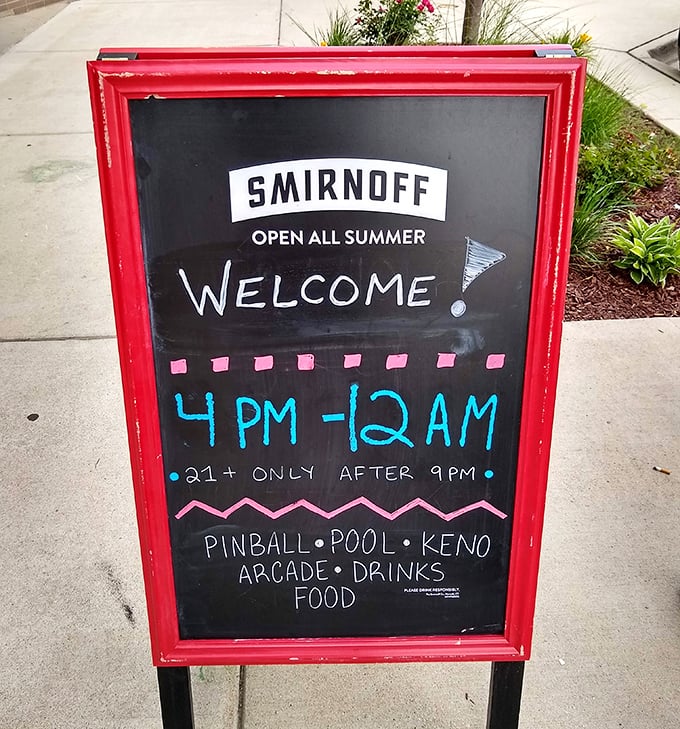 The cheerful sidewalk sign lays out Tilted's simple but irresistible formula: games, drinks, and fun from 4PM until the wee hours.