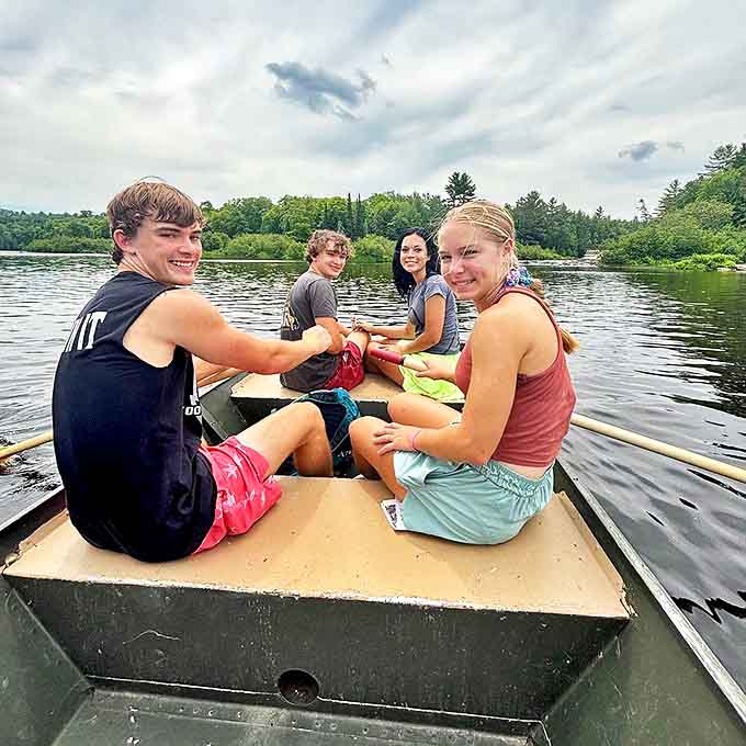 Huckleberry Finn meets Michigan adventure as these modern explorers navigate amber waters toward island-surrounded cascades.