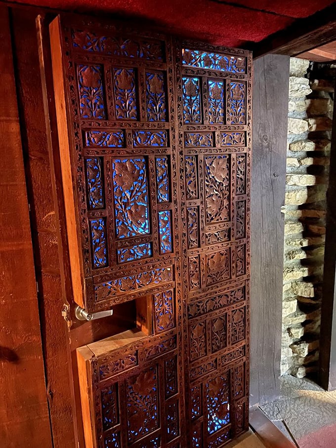 Vintage carousel horses hang suspended in mid-gallop, a gravity-defying display of craftsmanship from a bygone era.