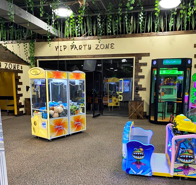The VIP party zone entrance promises exclusive prehistoric celebrations with arcade games visible just beyond the specially designated party space.