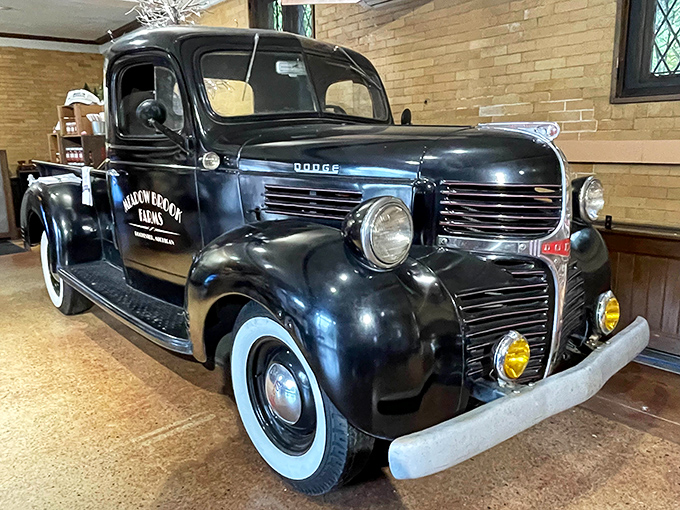 This vintage Dodge truck offers a fascinating contrast to the mansion's opulence &ndash; a tangible reminder that before luxury came innovation and hard work.