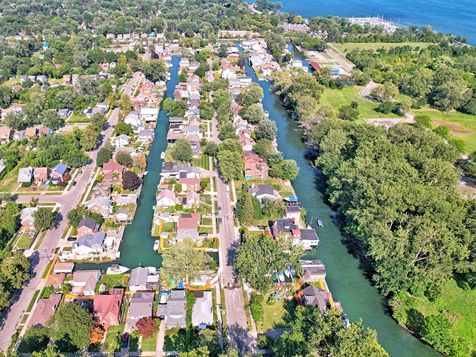 Detroit's secret canal network creates a stunning patchwork of blue waterways cutting through green neighborhoods in this remarkable aerial perspective.