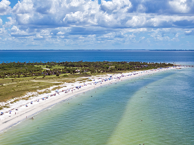 From above, Fort De Soto's beaches stretch like a white ribbon against the blue gradient of Gulf waters, a paradise hiding in plain sight.